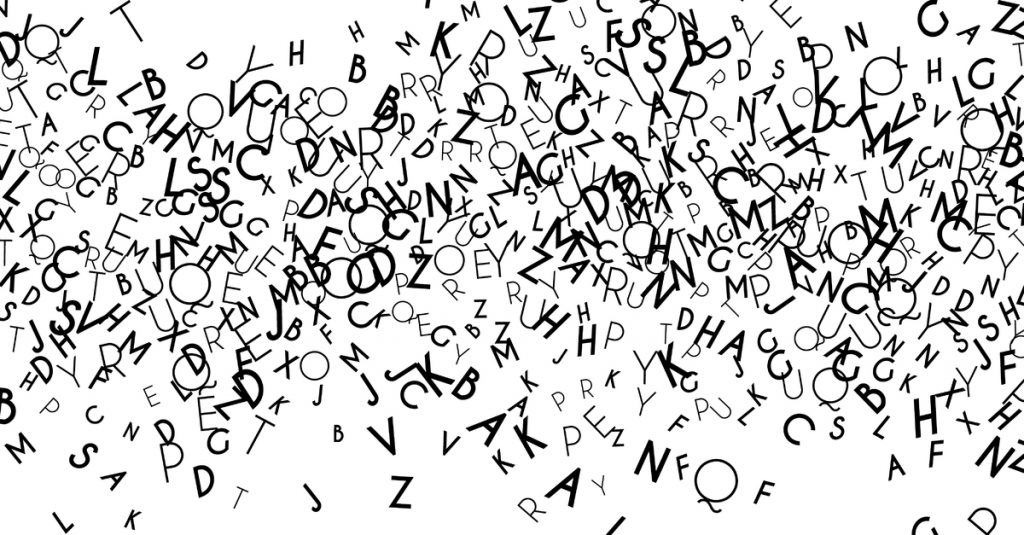 Letras dispersas sobre fondo blanco. | Leon Hunter